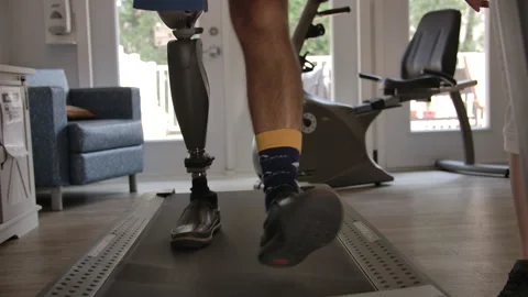 Amputee doing workout at home building s... | Stock Video | Pond5