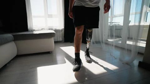 Amputee Man Learning to Walk with Prosth... | Stock Video | Pond5