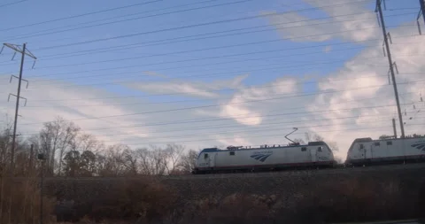 An Amtrak Passenger Train Passes by on T... | Stock Video | Pond5