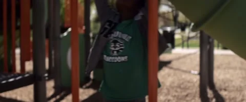 Anamorphic Little Black Girl On Slide 2 | Stock Video | Pond5
