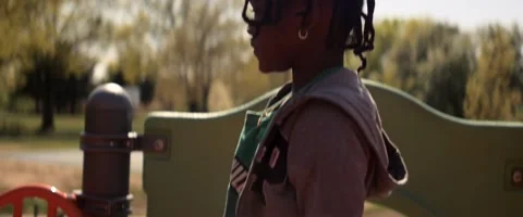 Anamorphic Little Black Girl Standing On... | Stock Video | Pond5