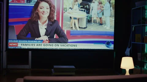 Anchorwoman on large TV screen showing r... | Stock Video | Pond5