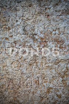 Ancient Alphabets on Marble Background Texture Stock Photo #74296815