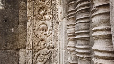 ancient bas-reliefs depicting a dinosaur... | Stock Video | Pond5