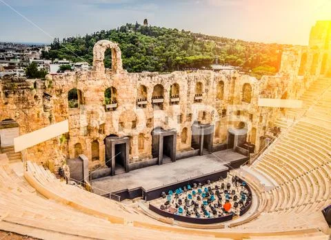 Ancient Herodes Atticus amphitheater with the cityscape on the ...