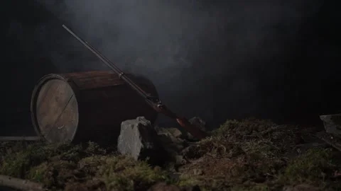 Ancient musket on a barrel among the smo... | Stock Video | Pond5