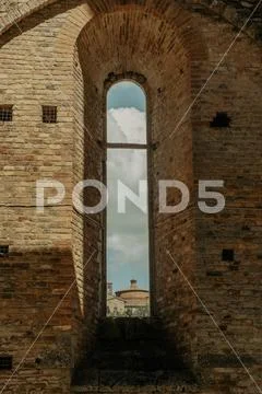 Photograph: Ancient palaces seen from an immense window of an medieval ...