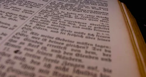 Ancient Scripture Lines In The Open Bibl... | Stock Video | Pond5