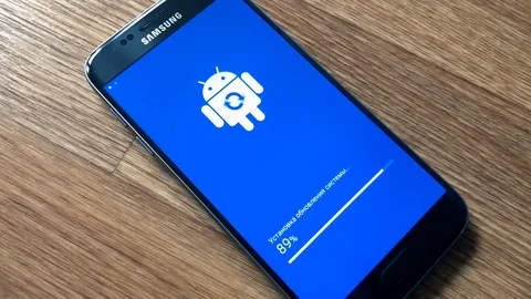 Android robot logo icon on the smart pho... | Stock Video | Pond5