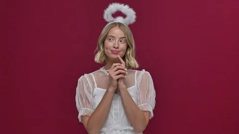 Angel girl scared of a demon girl appear... | Stock Video | Pond5