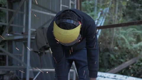 Angle grinder sparks impact on PPE face ... | Stock Video | Pond5