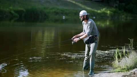 Angler Catching Fish On Rod. Fisher Usin... | Stock Video | Pond5