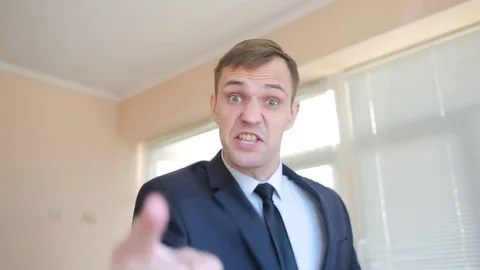 Angry businessman in office screaming at... | Stock Video | Pond5