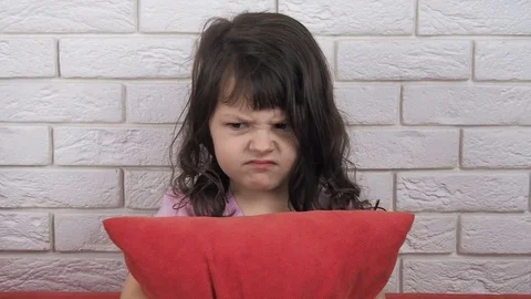 Angry child. Aggressive little girl hugs... | Stock Video | Pond5