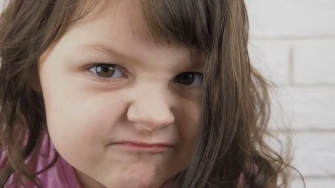 Angry child. Portrait of an angry little... | Stock Video | Pond5