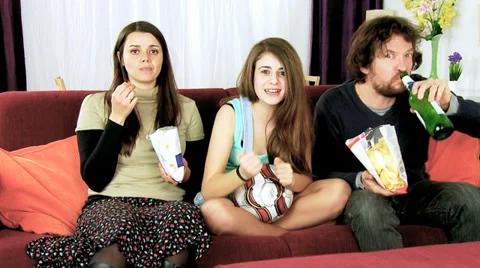 Angry family watching tv loosing game sl... | Stock Video | Pond5