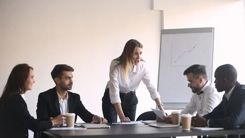 Angry female boss shouting at meeting fi... | Stock Video | Pond5