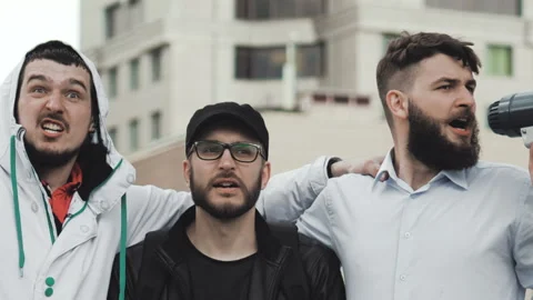 Angry football fans scream on street in ... | Stock Video | Pond5