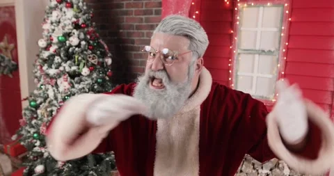 An angry furious Santa Claus in glasses ... | Stock Video | Pond5