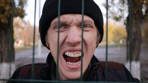 .angry guy screaming, looking heavy look... | Stock Video | Pond5