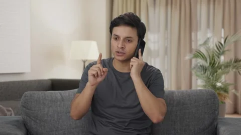 Angry Indian man shouting on phone | Stock Video | Pond5