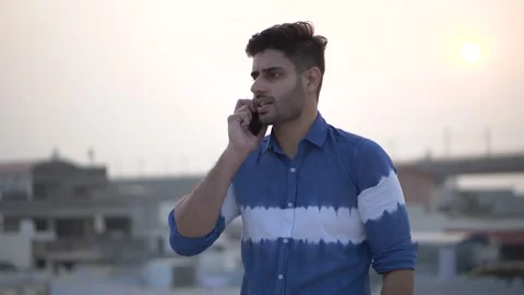 Angry Indian man speaking on phone call ... | Stock Video | Pond5
