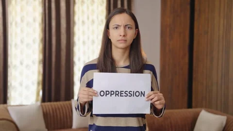 Angry Indian woman holding OPPRESSION ba... | Stock Video | Pond5