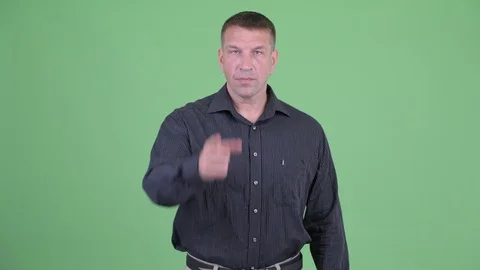 Angry macho mature businessman with thre... | Stock Video | Pond5