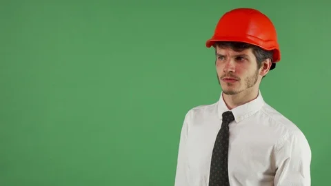 Angry male engineer shouting at someone ... | Stock Video | Pond5