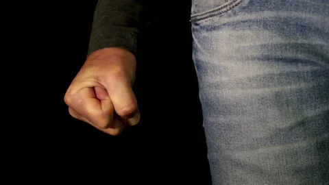 An Angry Man Clenching the Fist on black... | Stock Video | Pond5