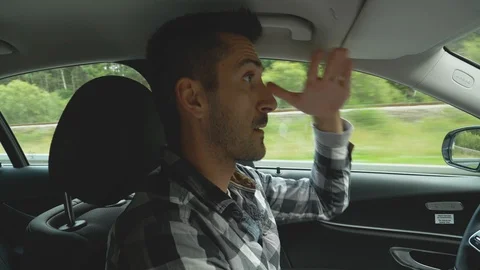 Angry man driver shows middle finger, ro... | Stock Video | Pond5