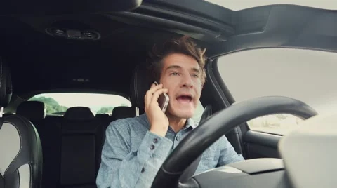 Angry man getting angry at phone while d... | Stock Video | Pond5