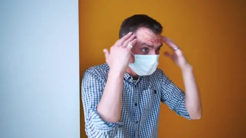 Angry man in mask swears and gestures. C... | Stock Video | Pond5