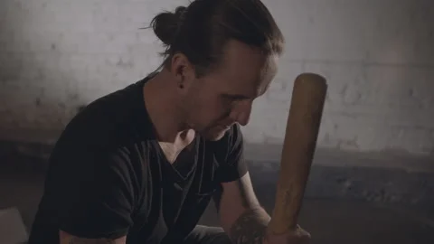 Angry Man Placing a Baseball Bat to His ... | Stock Video | Pond5