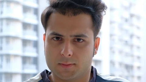 Angry man staring down the camera with e... | Stock Video | Pond5