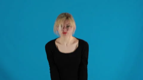 Angry model turns right and left holding... | Stock Video | Pond5