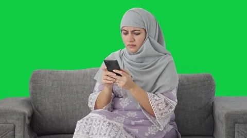 Angry Muslim woman messaging someone Gre... | Stock Video | Pond5