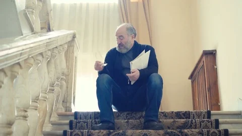 Angry old man throwing screenplay about ... | Stock Video | Pond5