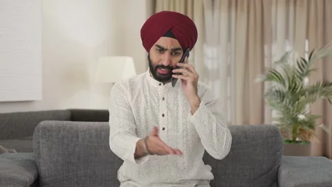Angry Sikh Indian man shouting on phone | Stock Video | Pond5