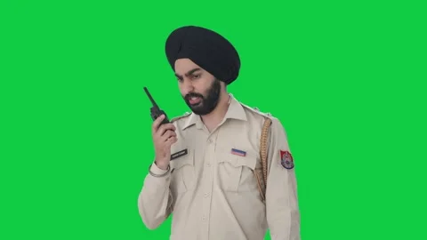 Angry Sikh Indian police man talking on ... | Stock Video | Pond5