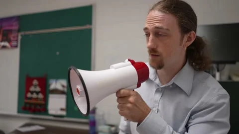 Angry teacher shouting in classroom into... | Stock Video | Pond5