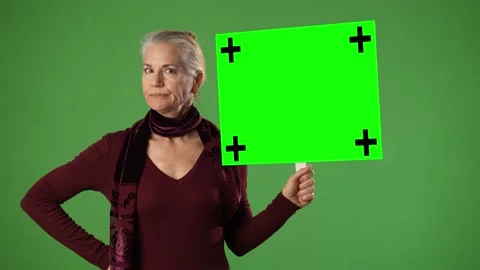 Angry woman holds a green screen chroma ... | Stock Video | Pond5