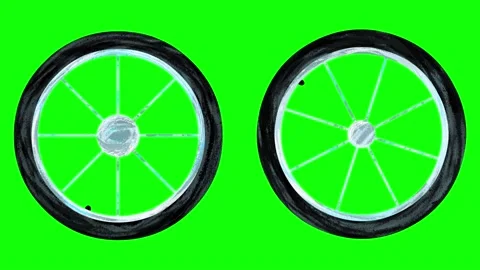 Animated bicycle wheels rotating on gree... | Stock Video | Pond5
