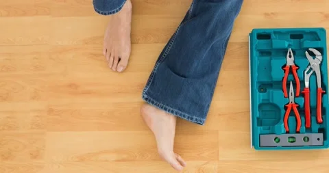 Animation of bare feet of woman in jeans... | Stock Video | Pond5