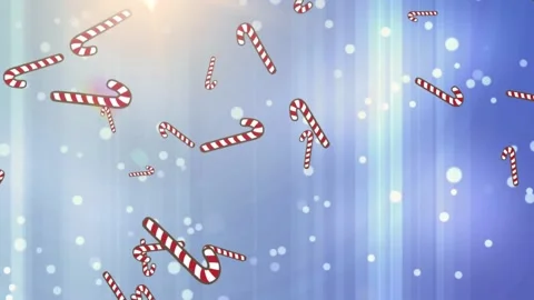 Animation of candy canes falling over gl... | Stock Video | Pond5