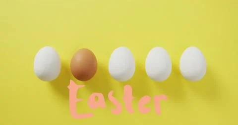 Animation of easter over eggs on yellow ... | Stock Video | Pond5