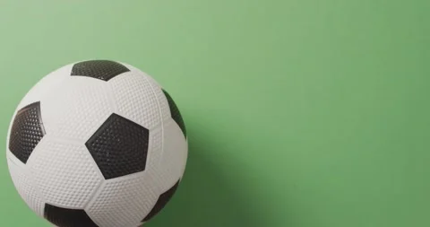 Animation of football over green backgro... | Stock Video | Pond5
