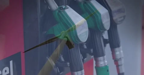 Animation of gas station over wing turbi... | Stock Video | Pond5