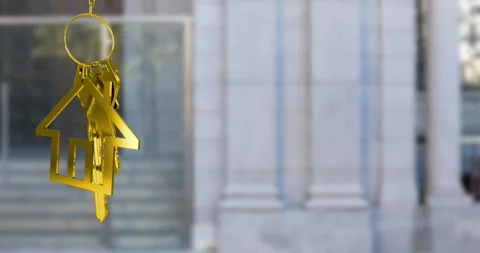 Animation of hanging golden house keys a... | Stock Video | Pond5