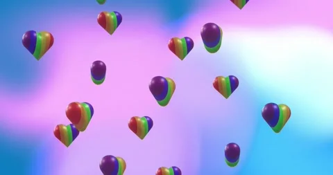 Animation of rainbow hearts spinning on ... | Stock Video | Pond5